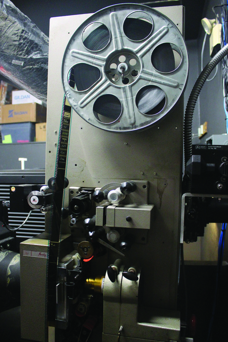 Up in the projection booth, showing movies the old-fashioned way in Tucson